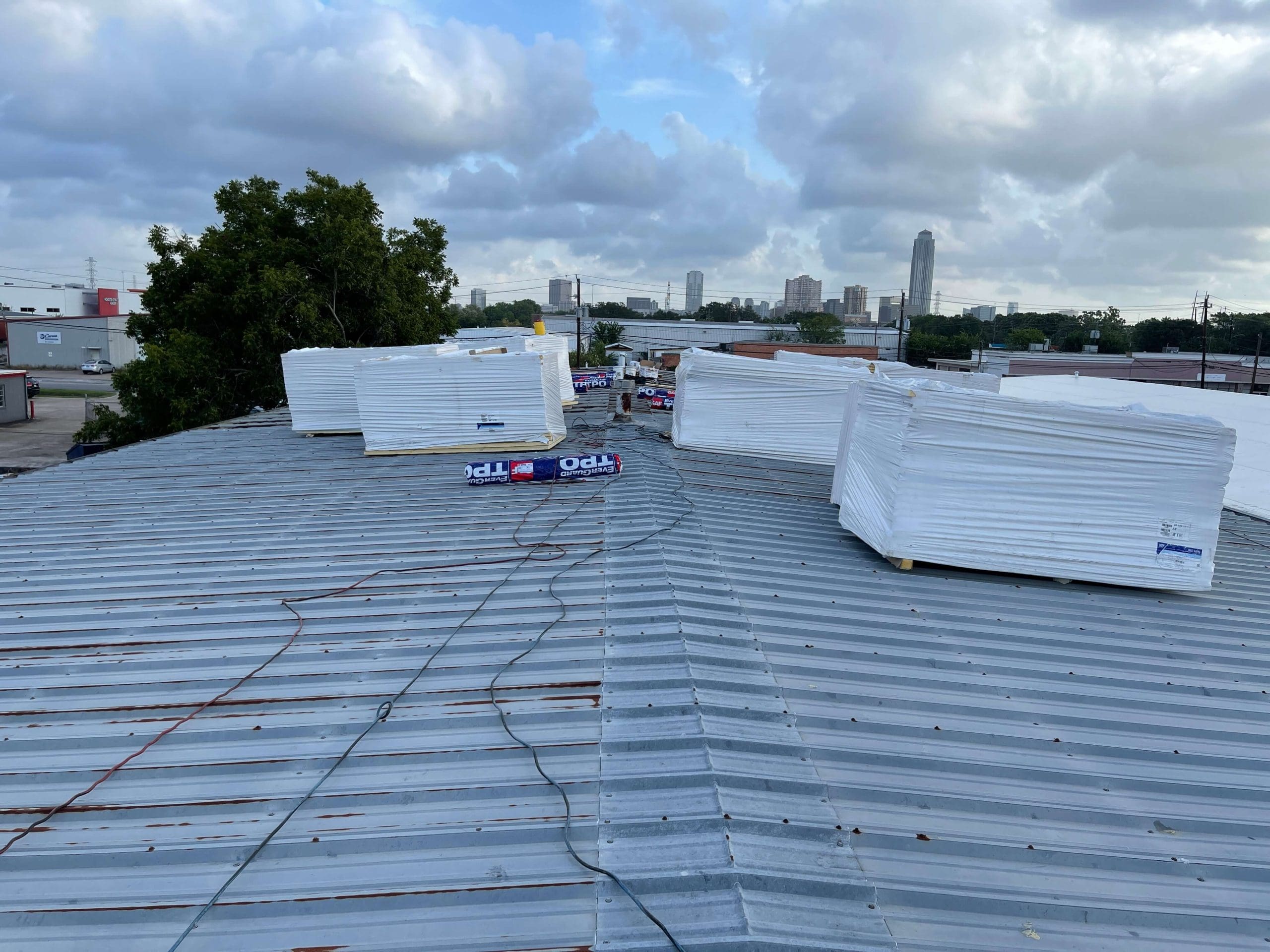 TPO Metal Retrofit Roof Installation Houston – HHH Roofing & Construction
