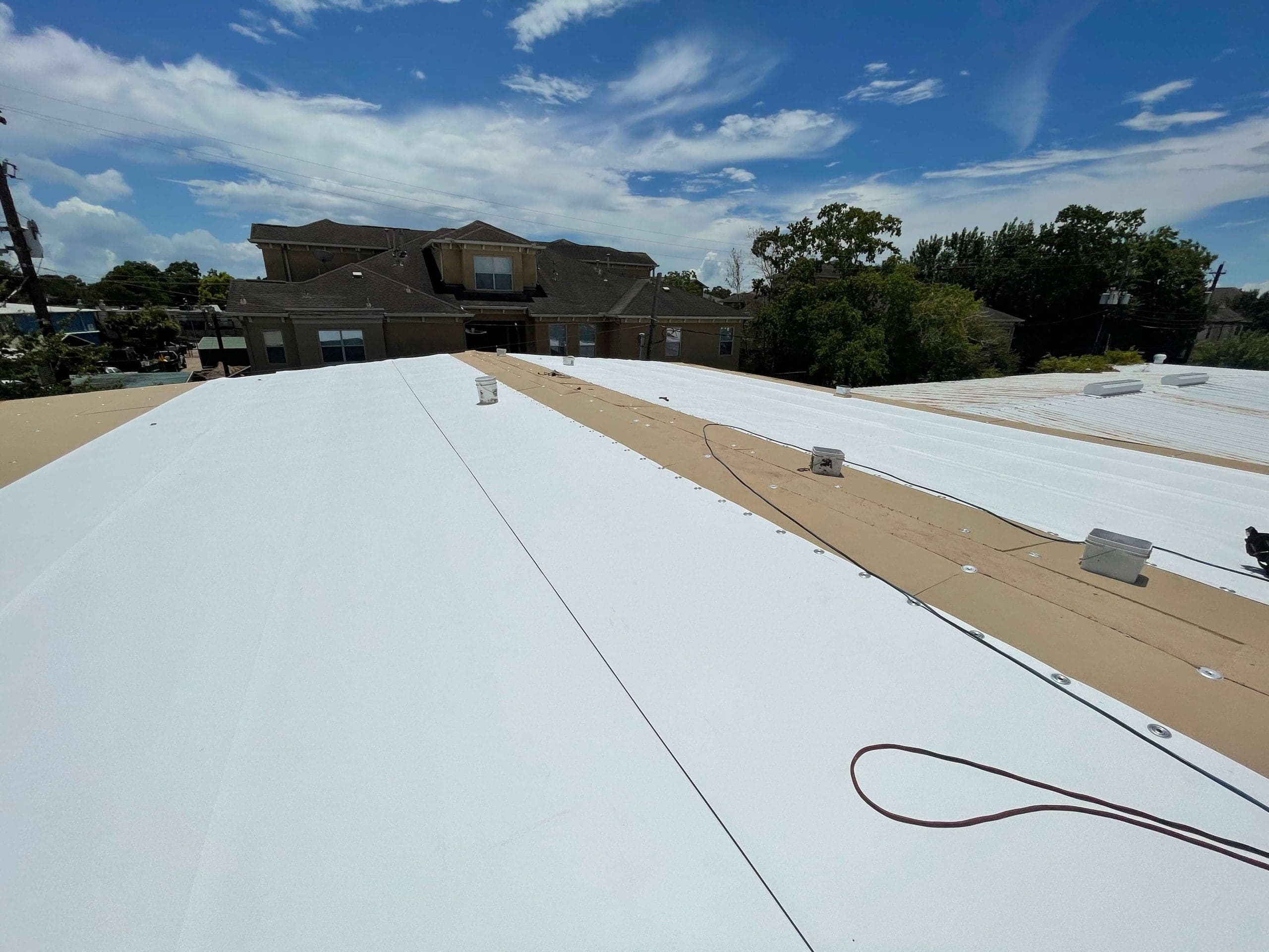 TPO Metal Retrofit Roof Installation Houston – HHH Roofing & Construction