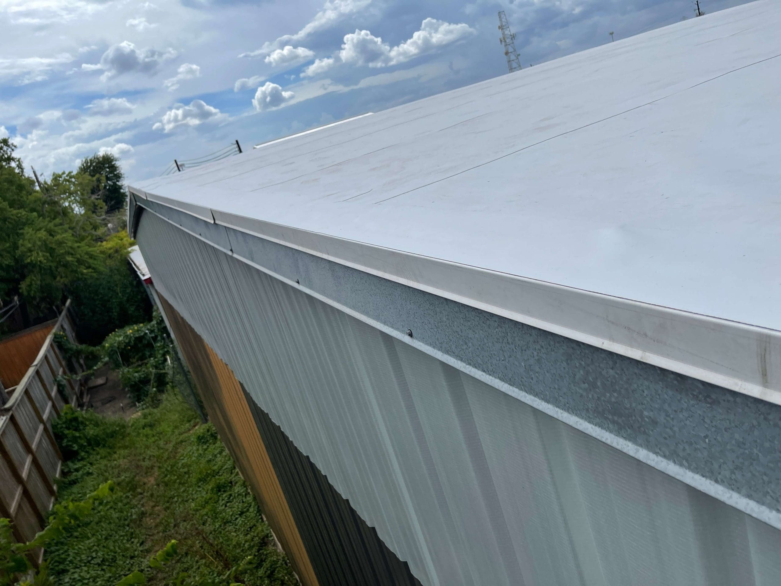 TPO Metal Retrofit Roof Installation Houston – HHH Roofing & Construction