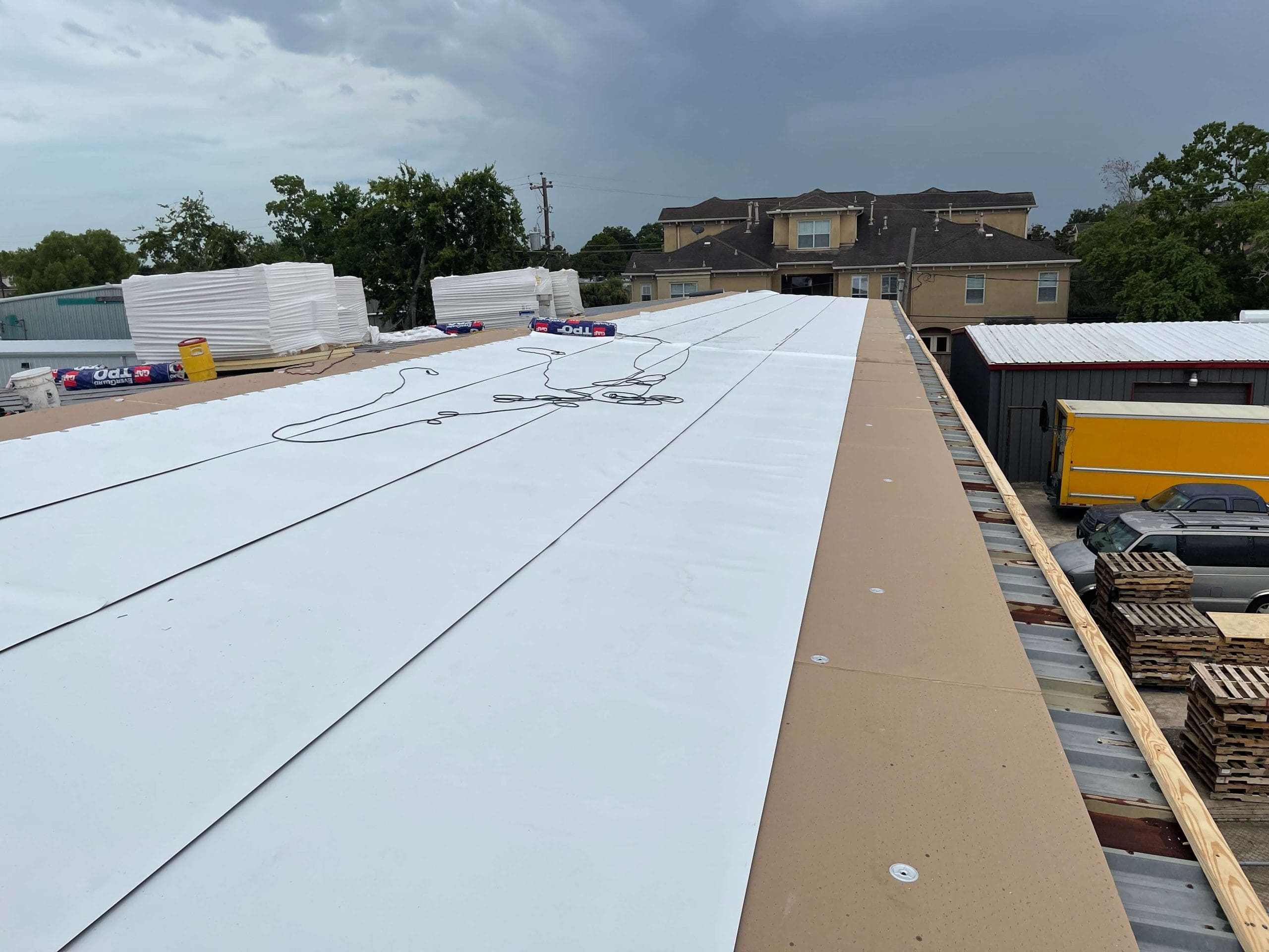 TPO Metal Retrofit Roof Installation Houston – HHH Roofing & Construction